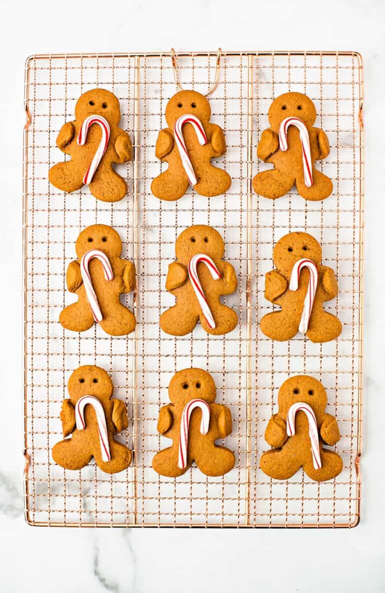 Gingerbread Holding Candy Canes - Cute gingerbread men recipe