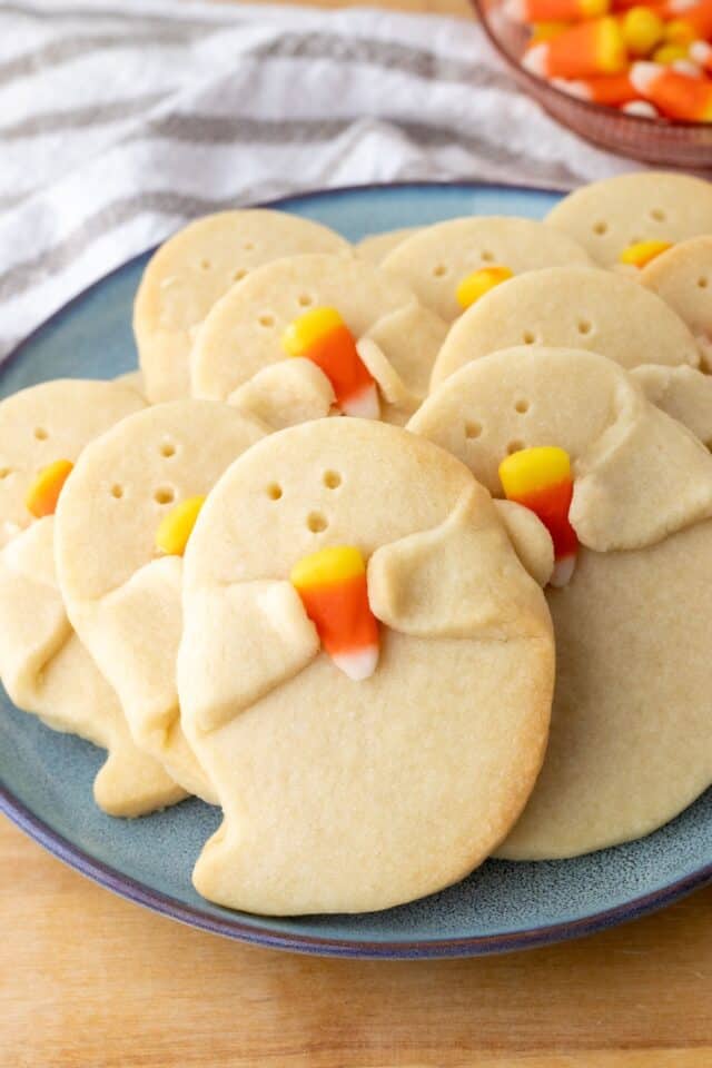 Cutest Ghost Cookies Holding a Candy Corn