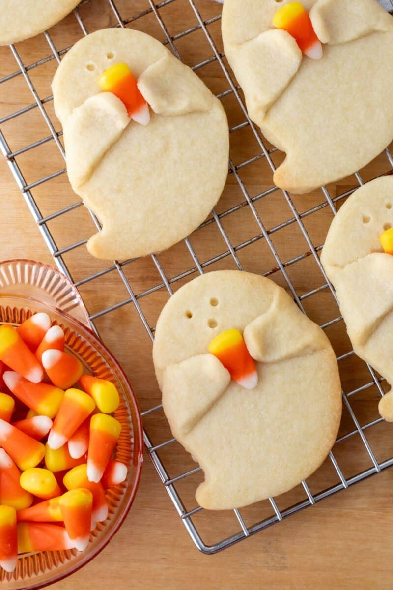 Cutest Ghost Cookies Holding a Candy Corn
